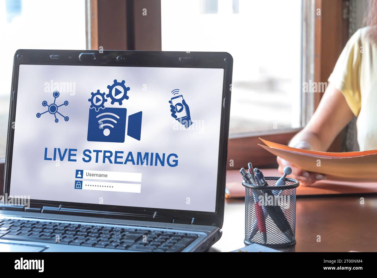 Laptop screen displaying a live streaming concept Stock Photo - Alamy