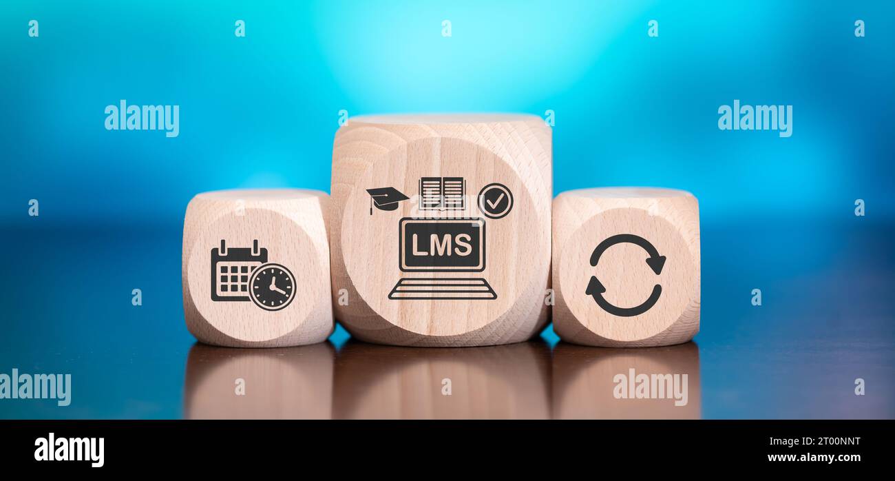 Wooden blocks with symbol of lms concept on blue background Stock Photo ...