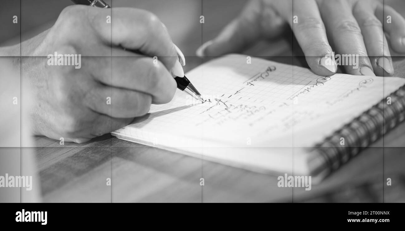 Female hands with pen writing on notepad, geometric pattern Stock Photo ...