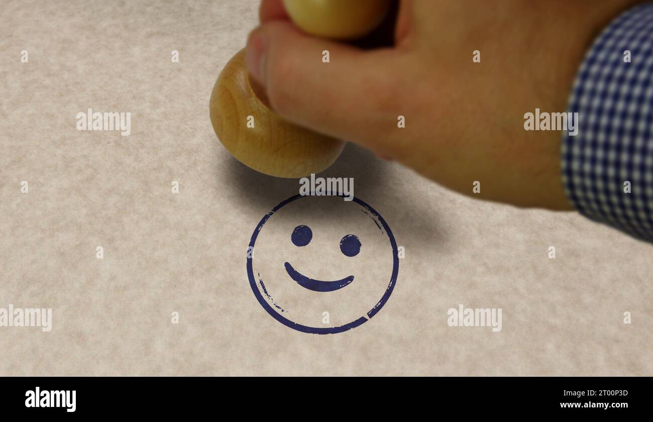 Smiley emoticon stamp and stamping hand. Smile emoji concept Stock ...