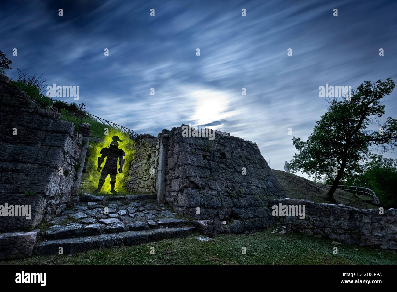 Bright knight among the ruins of the medieval castle of Nomi ...