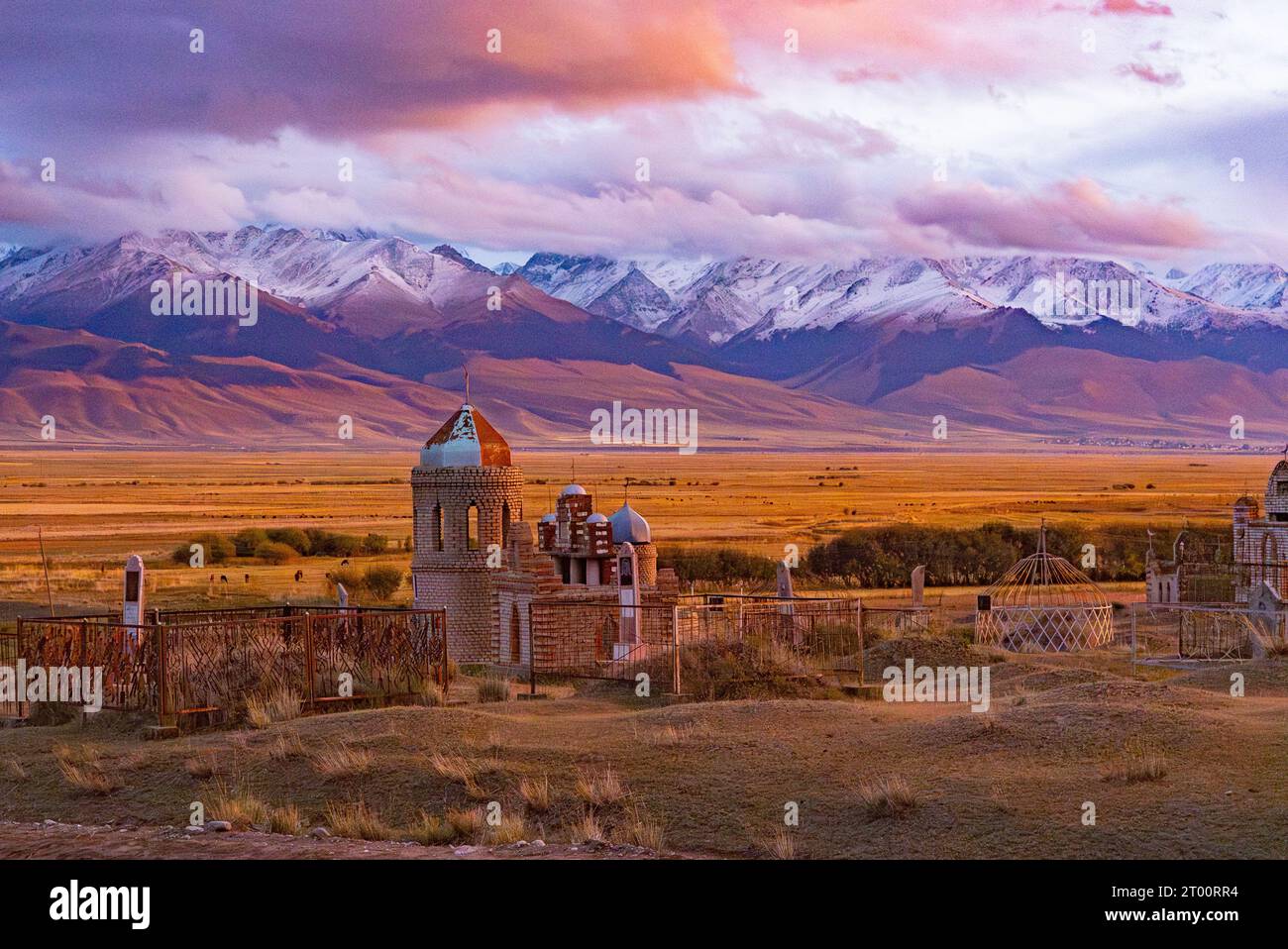 Traditional Muslim cemeteries outside villages in Kyrgyzstan Stock ...