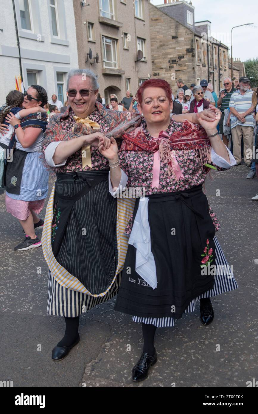 Traditional Scottish dancing women wearing old fashioned Fishwives ...