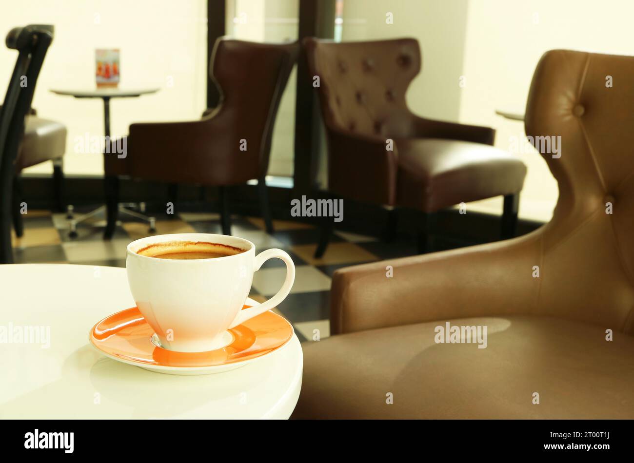 Cup of Hot Coffee on Cafe's Round Shaped Table Stock Photo - Alamy