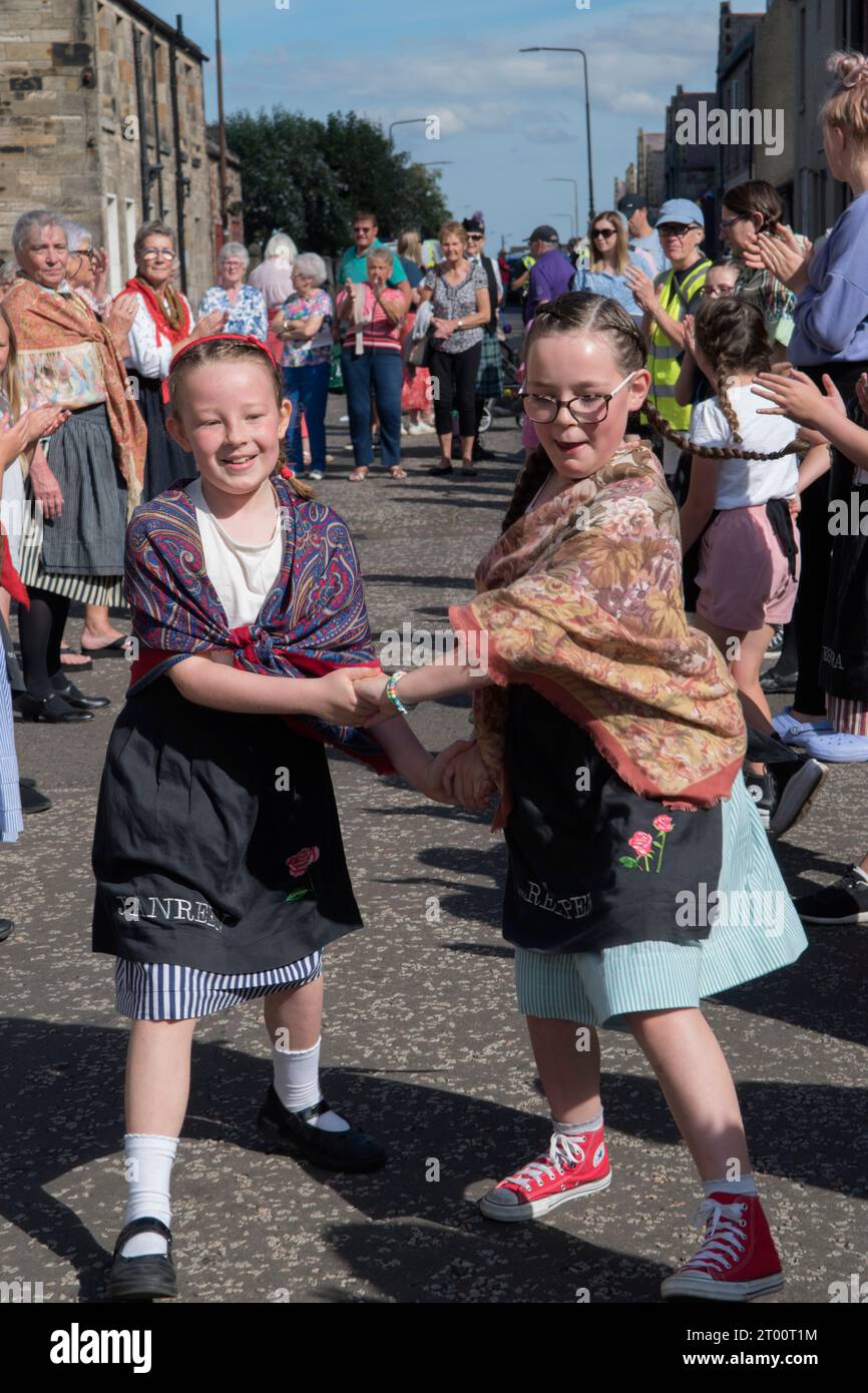 Scottish culture local children taking part dancing in the street at ...