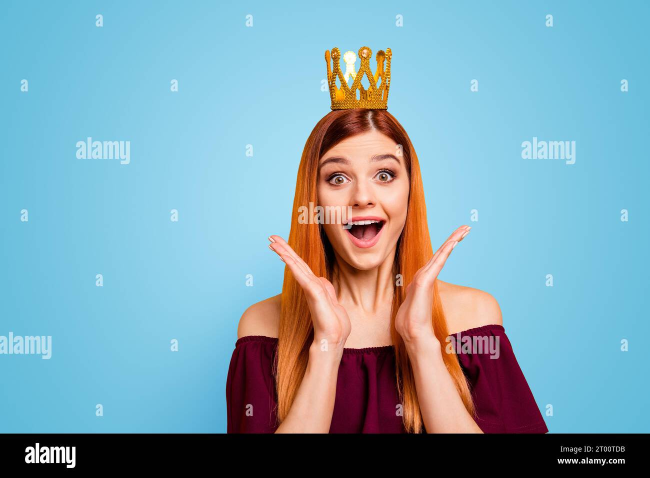 Lady with the surprised face and crown on her head opened her mouth and ...