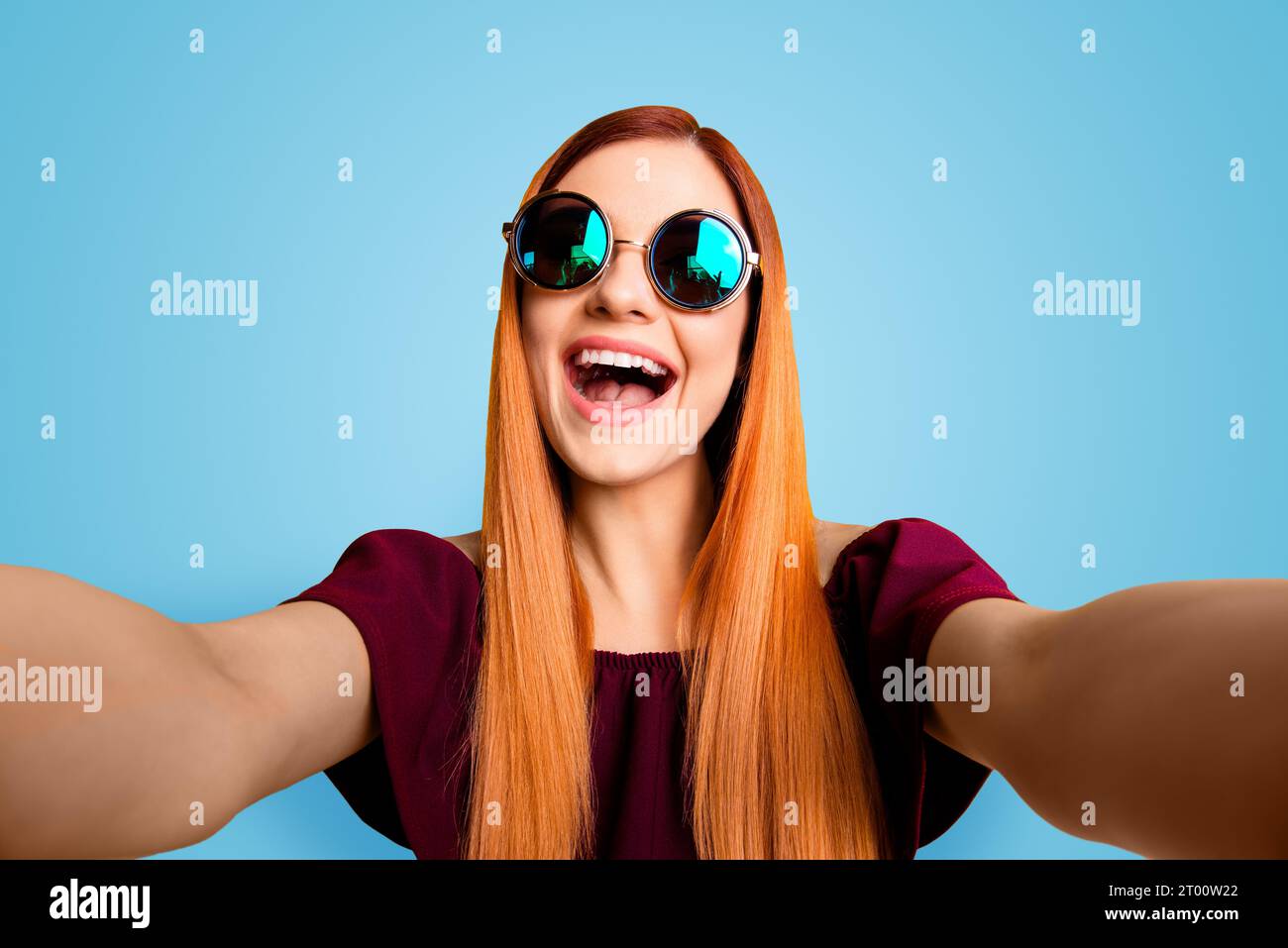 Close up portrait of silly mad girl in glasses with beaming smile ...