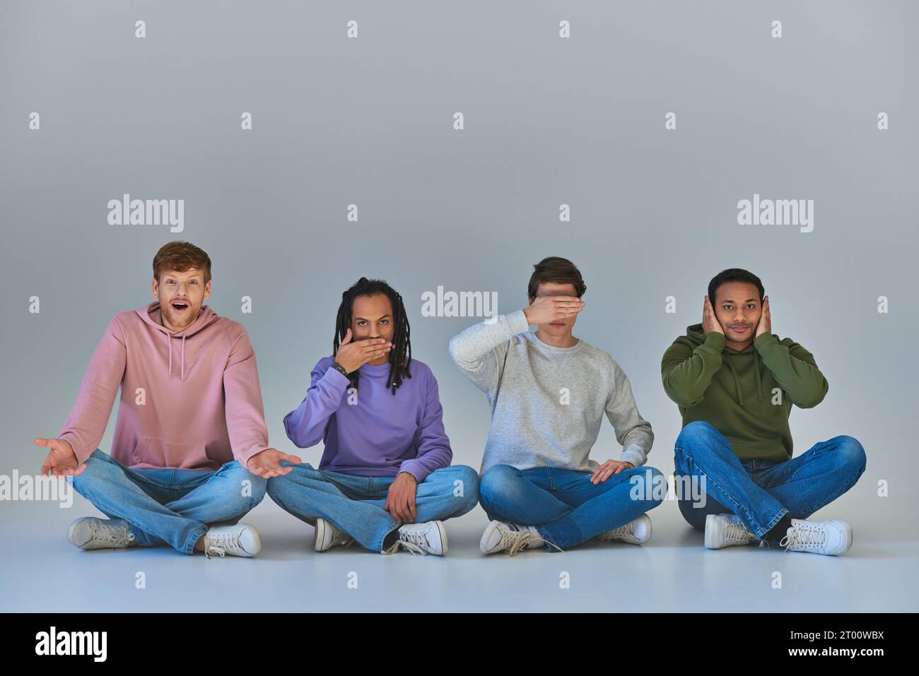 four young men sitting with crossed legs and gesturing, like four wise ...