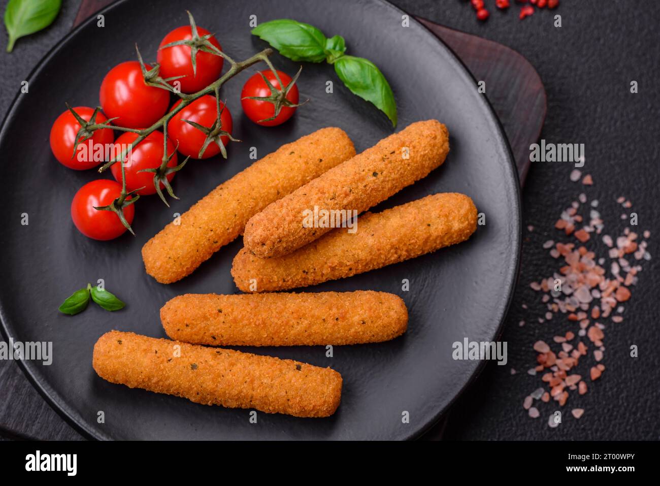 Delicious crispy cheese sticks with mozzarella, salt and spices ...