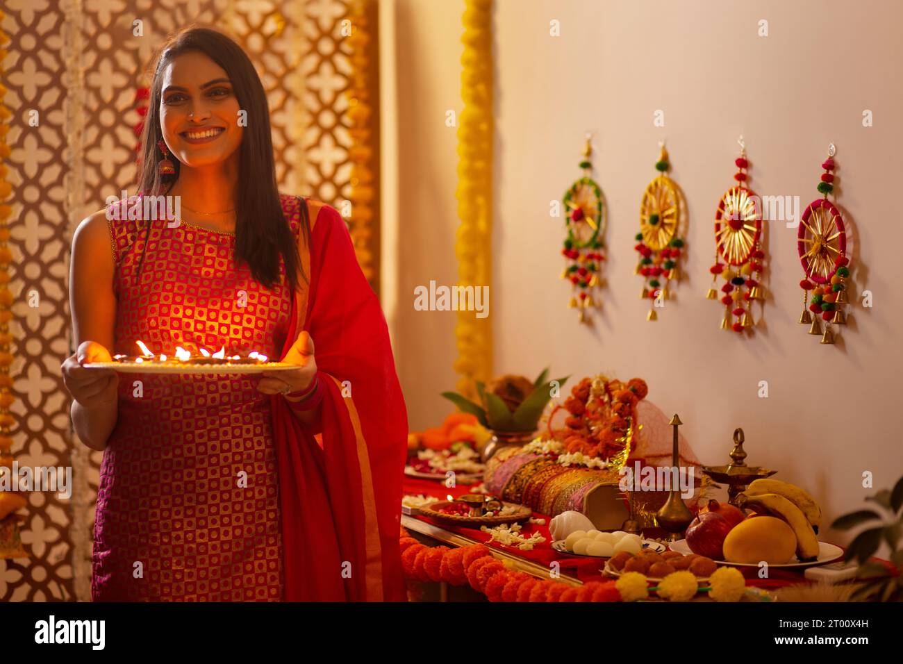 Woman worshipping (Goddess Laxmi, goddess of wealth ) on the during ...