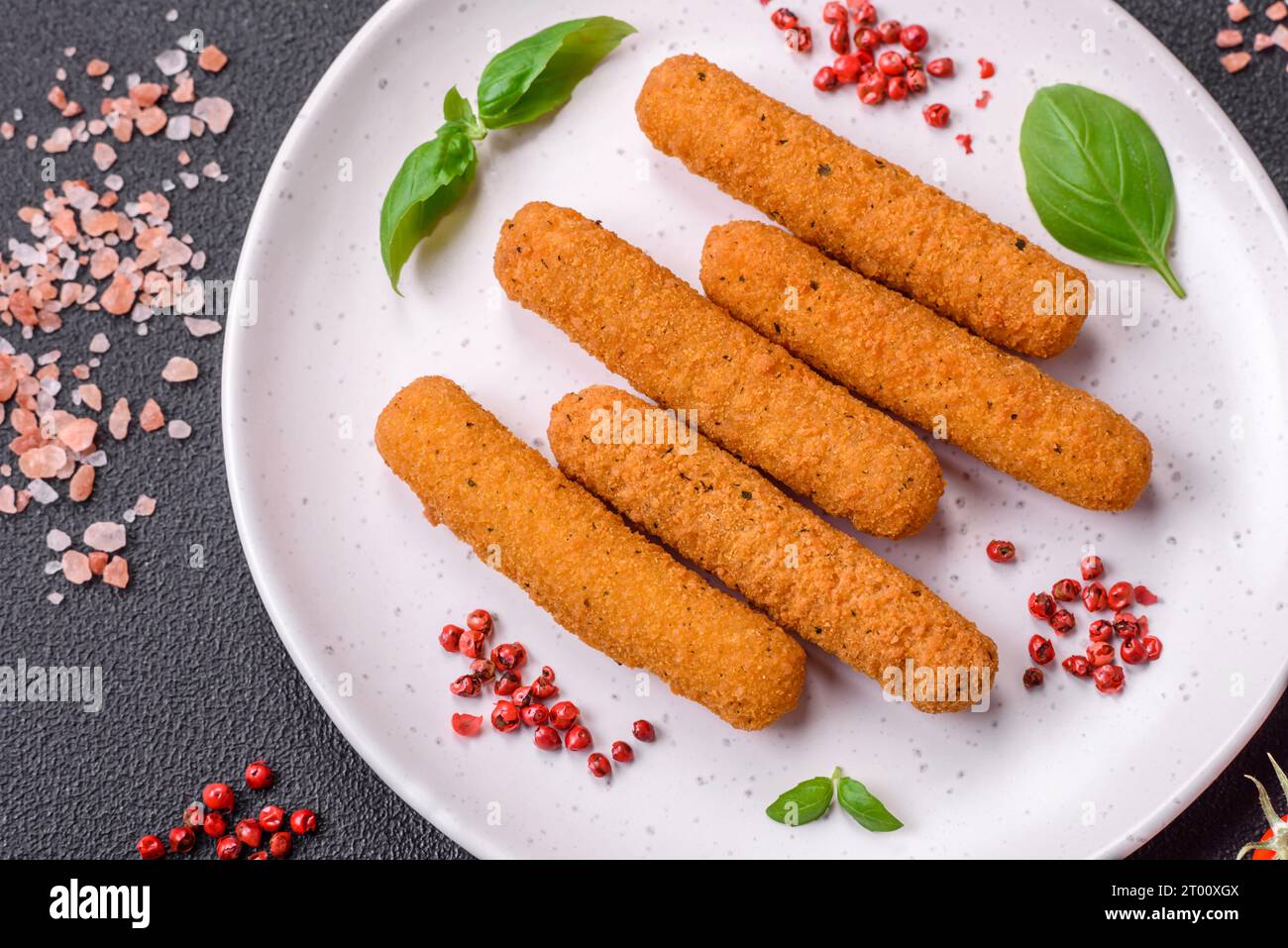 Delicious crispy cheese sticks with mozzarella, salt and spices ...