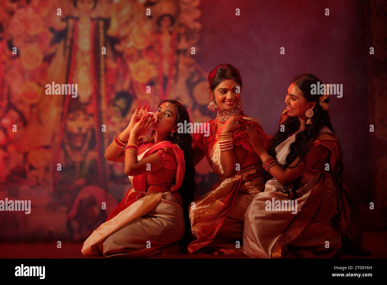 Bengali family celebrating Durga Puja Stock Photo - Alamy
