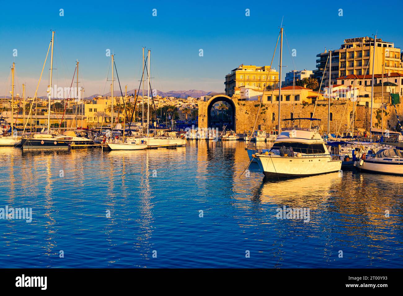 Sunset in port of Heraklion, capital of Crete island, Greece. Fishing ...