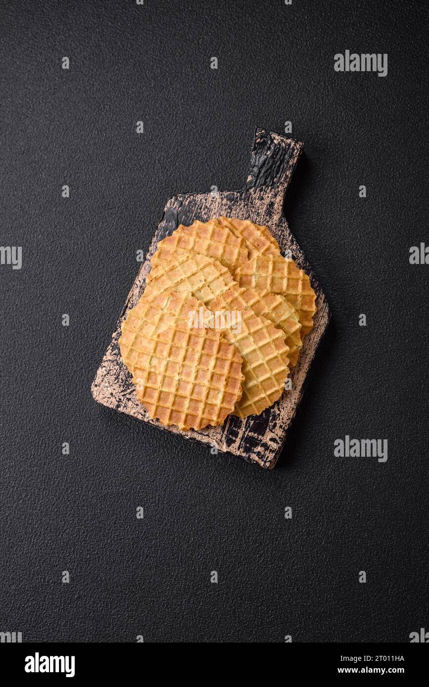 Round crispy wafers for making sweet delicious desserts or snacks on a ...