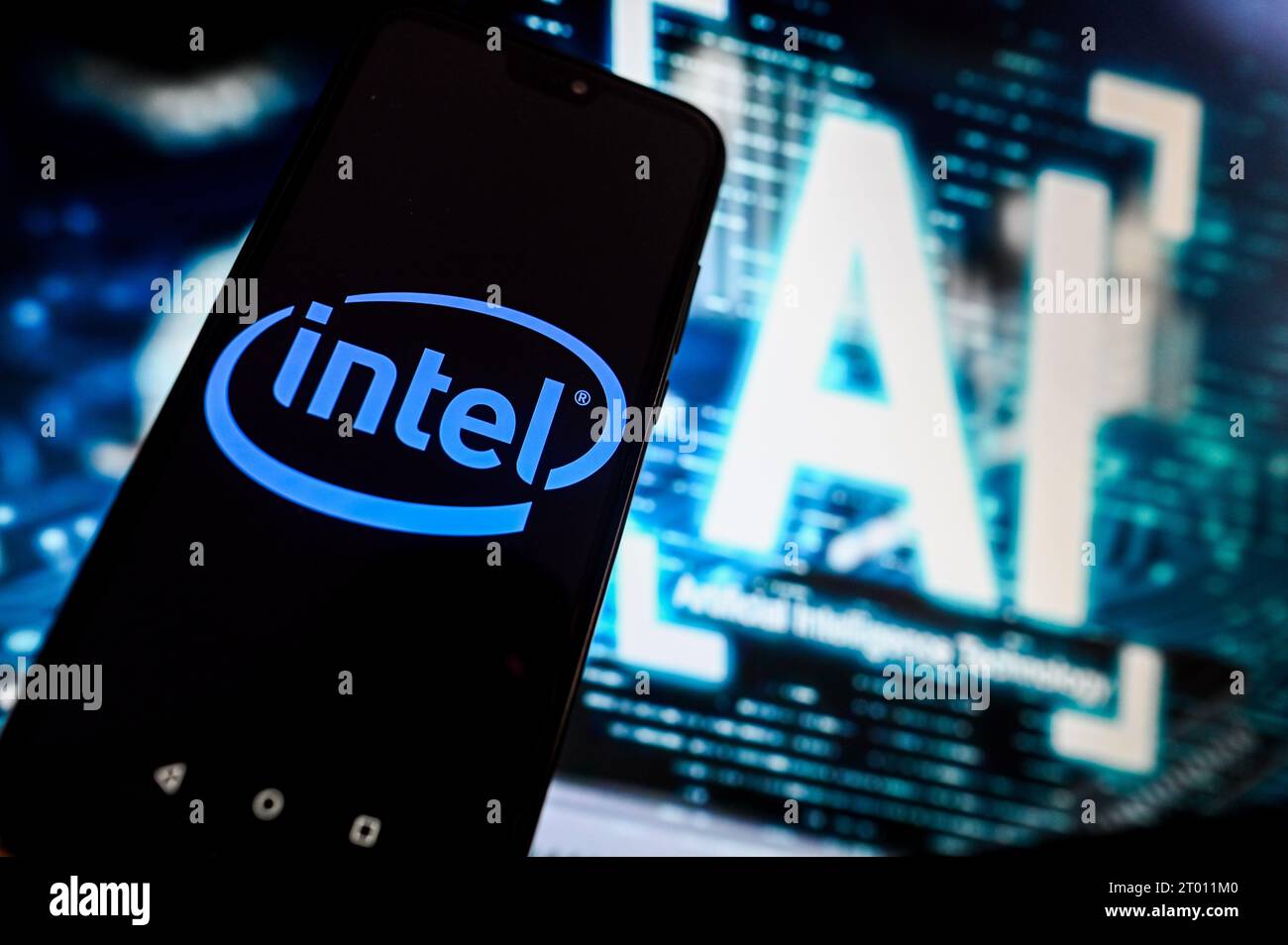 In this photo illustration, an Intel logo is displayed on a smartphone ...