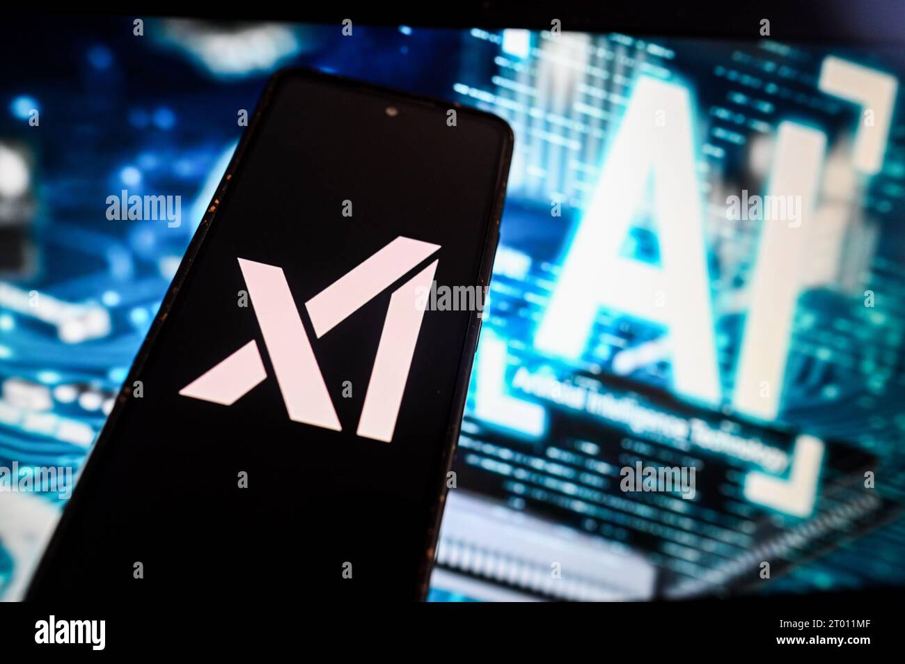 In this photo illustration, the xAI logo is displayed on a smartphone ...