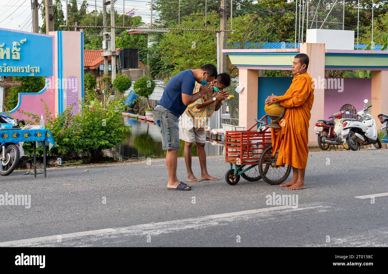 Thai Monks on Alms Rounds Stock Photo - Alamy