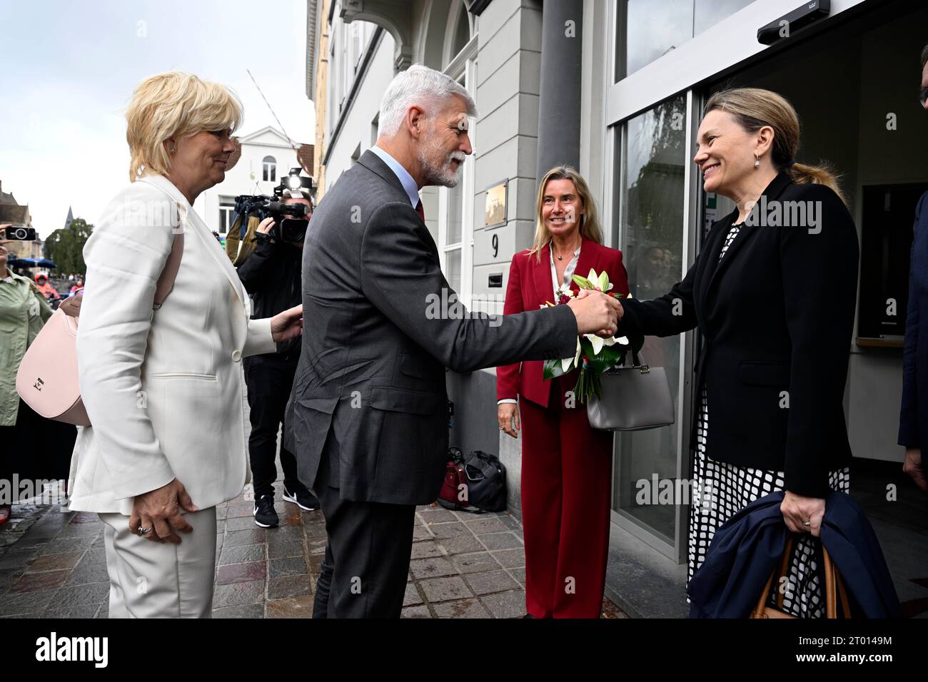 Czech President Petr Pavel, center, and his wife Eva Pavlova, left ...
