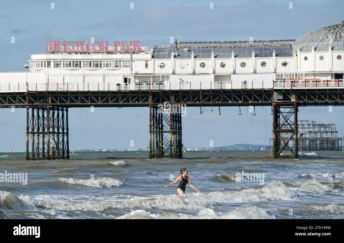 Brighton UK 3rd October 2023 - Swimmers enjoy a warm sunny day on ...