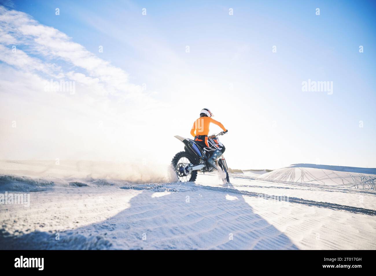 Desert, back and man on motorbike outdoor to race, adventure or travel ...