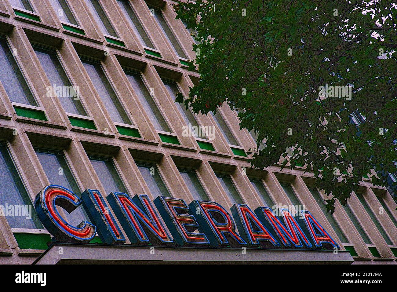 Vintage and retro facade with entrance and name sign of cinema and ...
