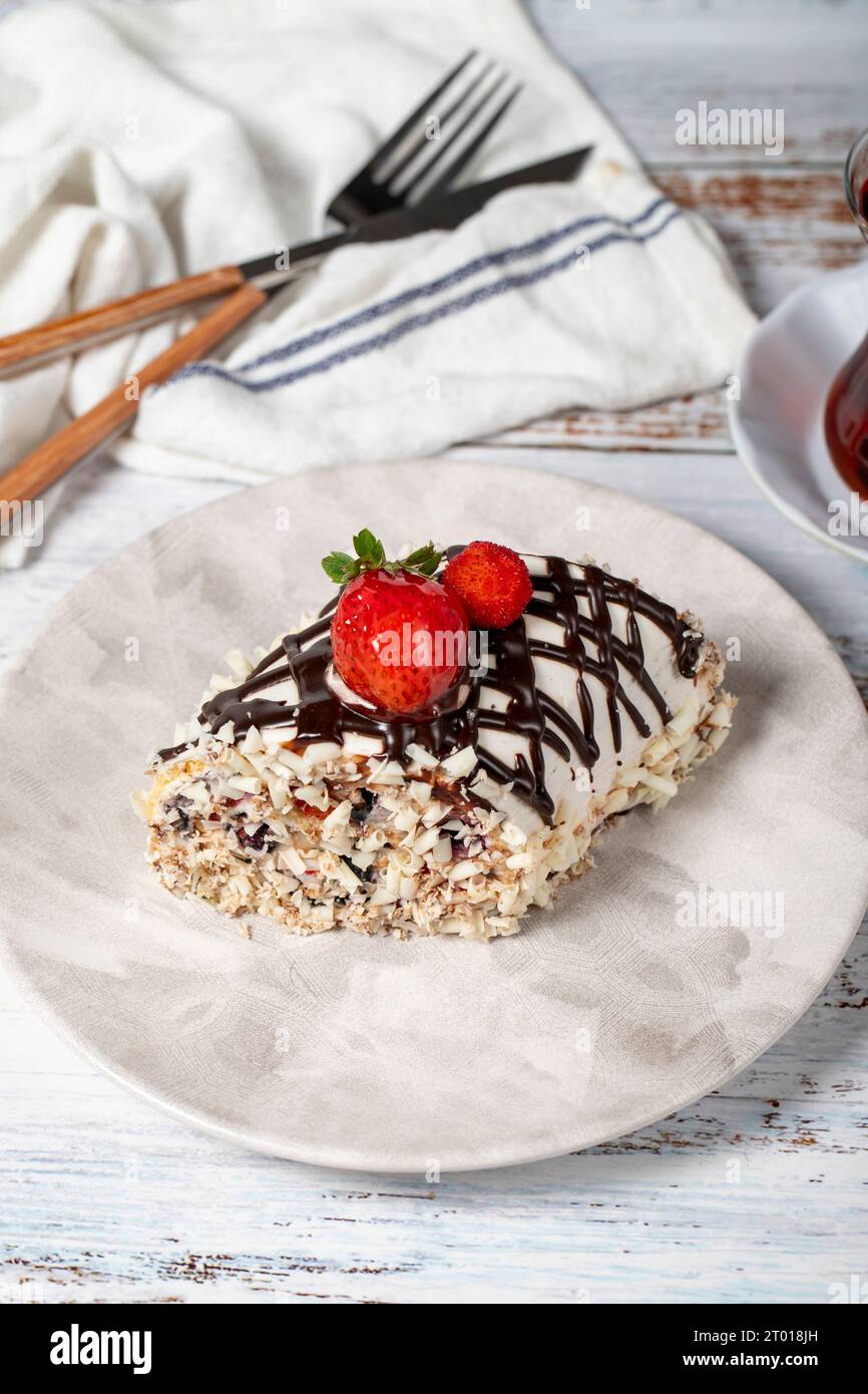 Strawberry log cake. Strawberries and cream cake on a white background ...