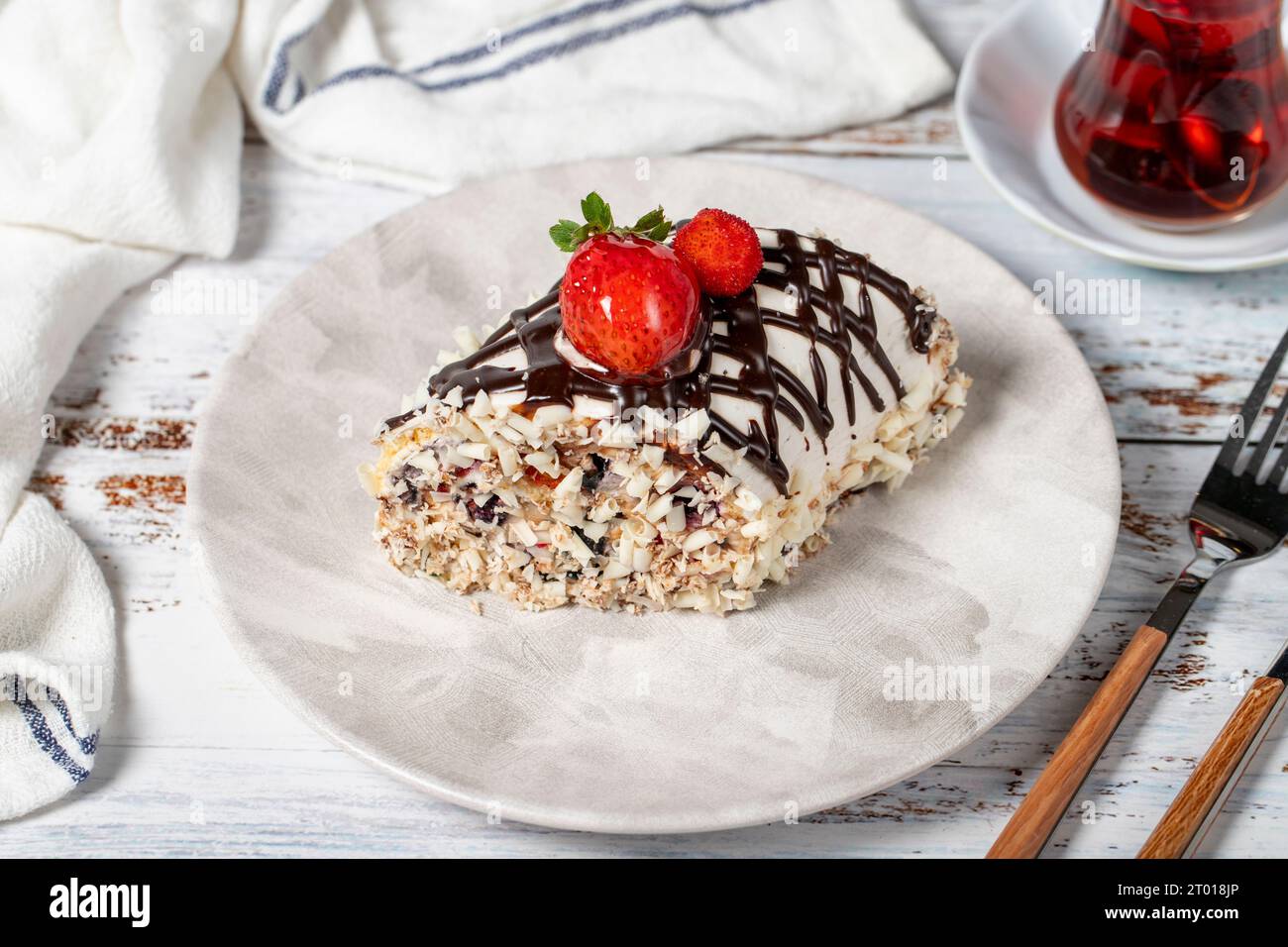 Strawberry log cake. Strawberries and cream cake on a white background ...