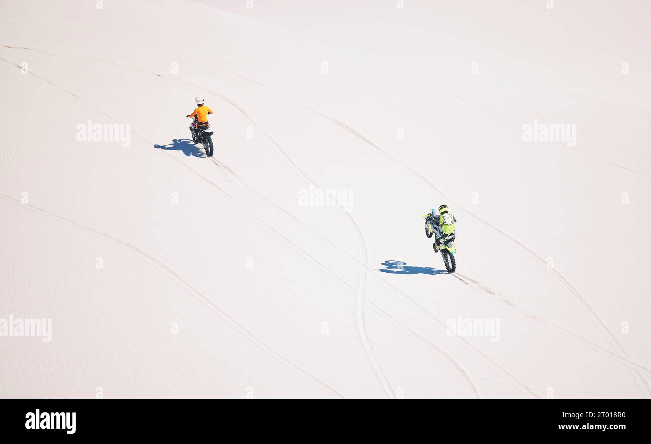 Motorcycle, desert drive and moto sport with people outdoor on hill ...