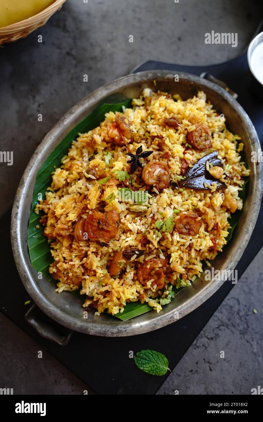 Shrimp Biryani | Malabar Chemmeen biryani served with yogurt raita ...