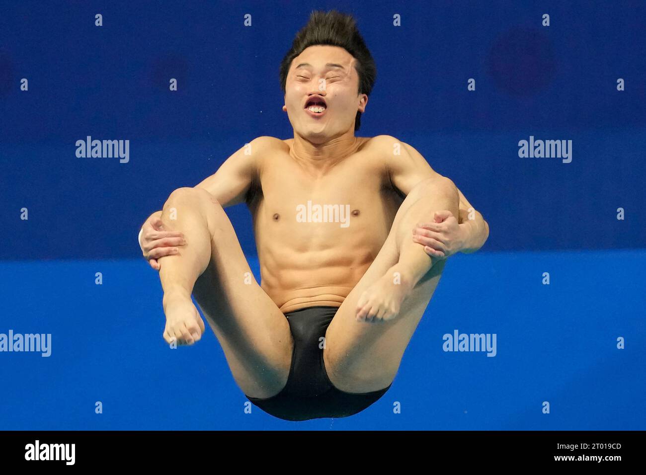 South Korea's Woo Haram competes in the Diving Men's 3m Springboard ...