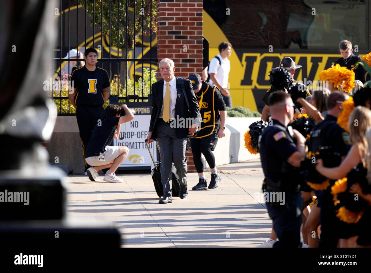 Iowa head coach Kirk Ferentz arrives at Kinnick Stadium before an NCAA ...