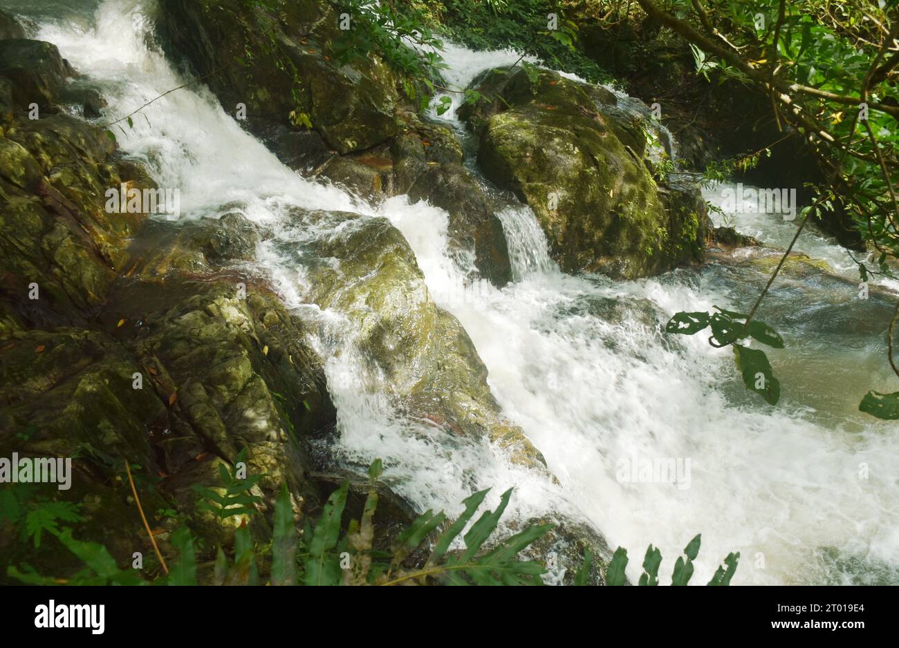 water falling on river pass rock and stone at north Chet Kod waterfall ...