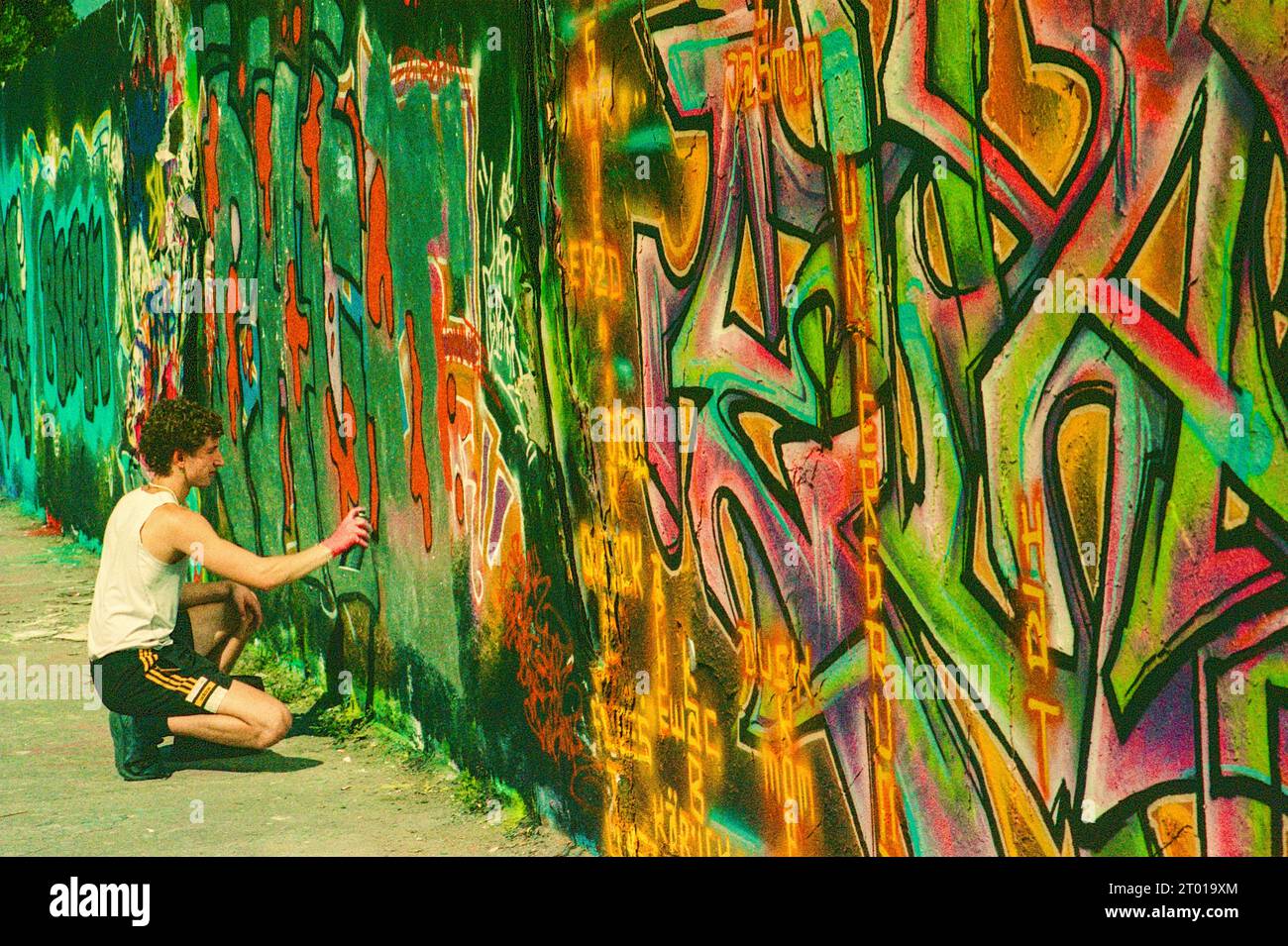 International Urban Artist creating Piece of Graffiti at Mauerpark on a ...