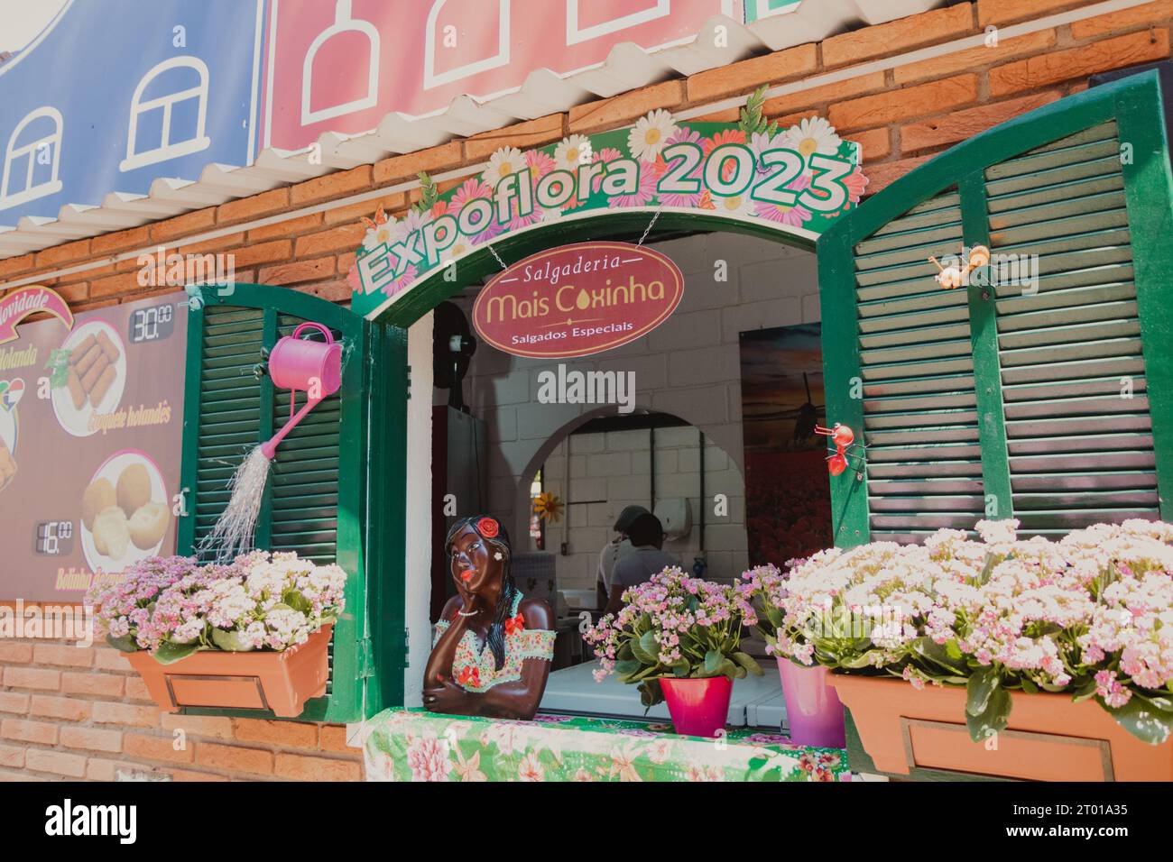 cute flower shop window view Stock Photo - Alamy
