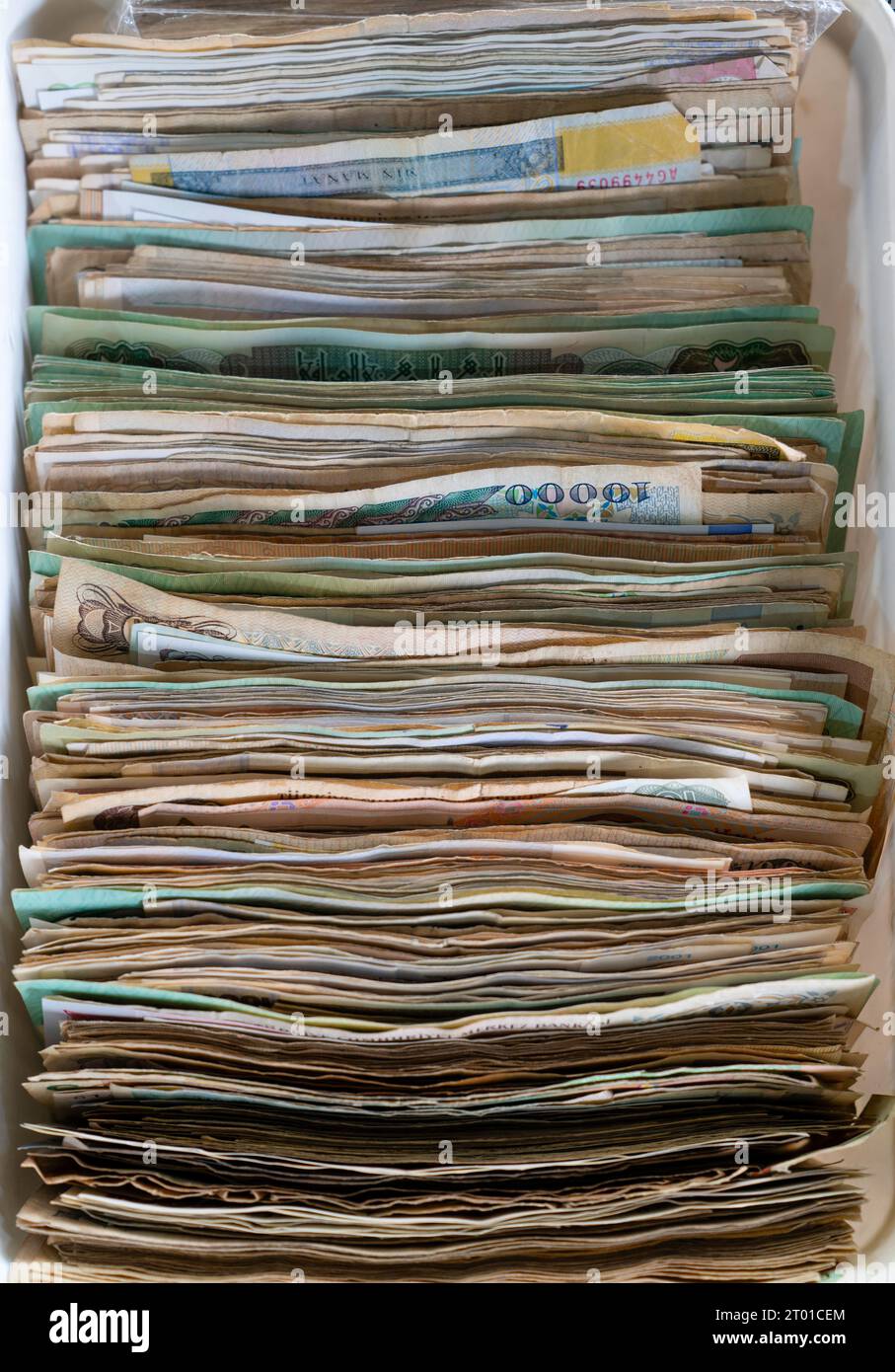 Various international money collections as background Stock Photo - Alamy