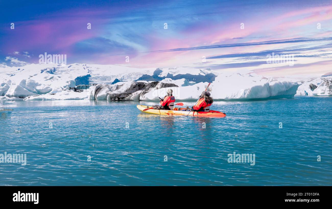 kayaking in Iceland next to glacier iceberg Stock Photo - Alamy