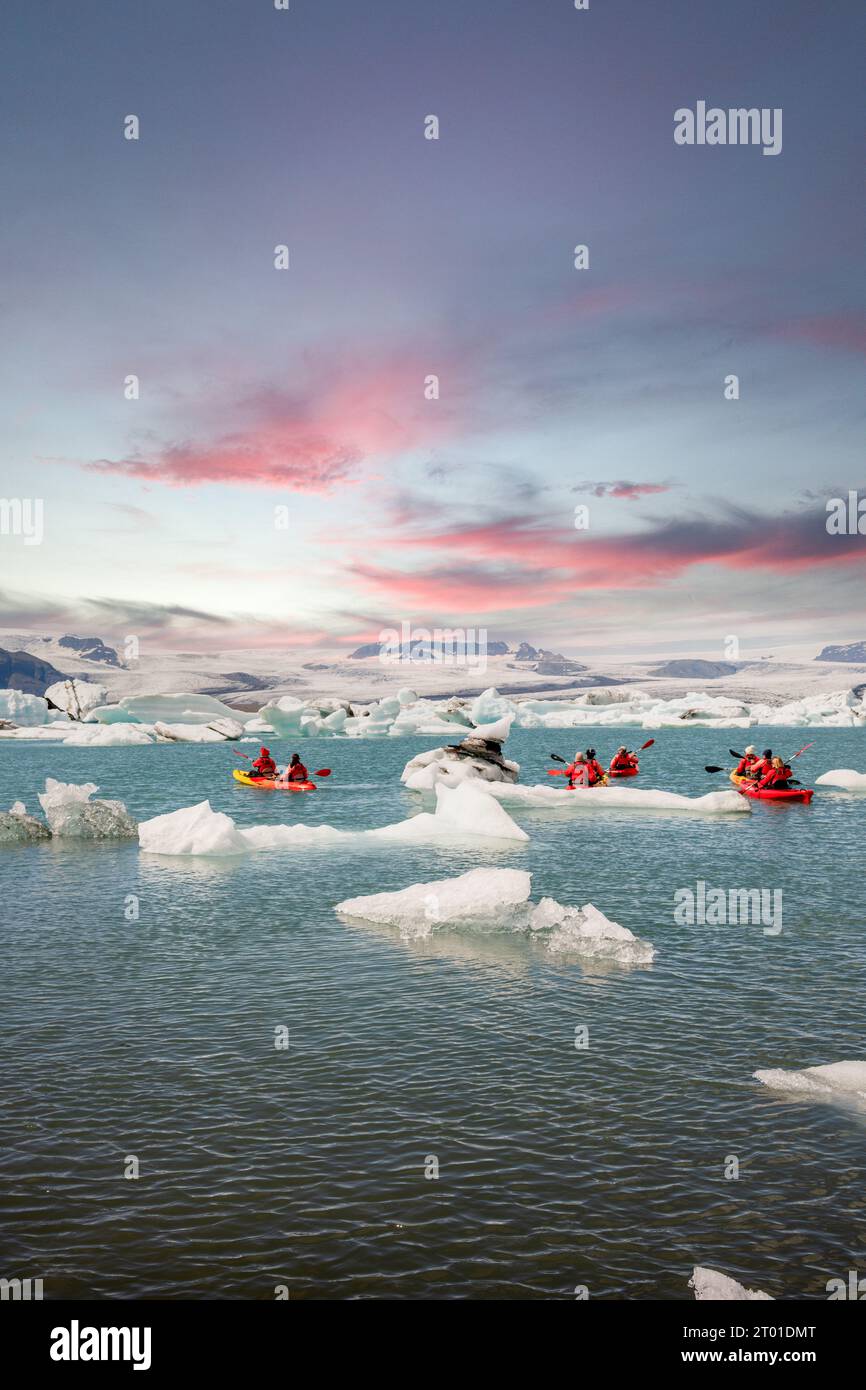 kayaking in Iceland next to glacier iceberg Stock Photo - Alamy