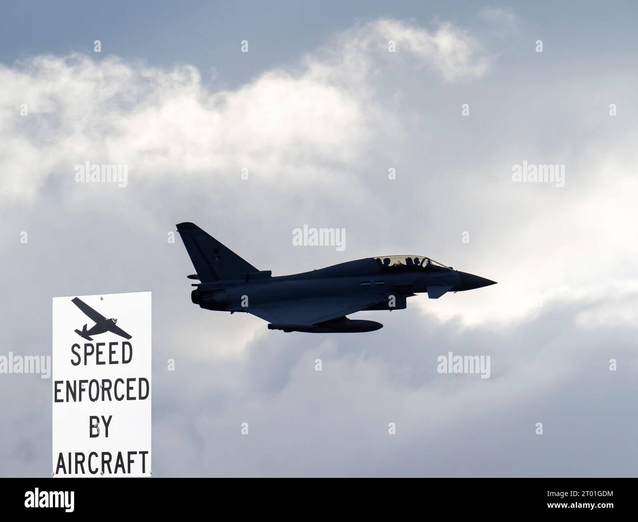 An RAF fighter jet practising low flying over Ambleside, Lake District ...