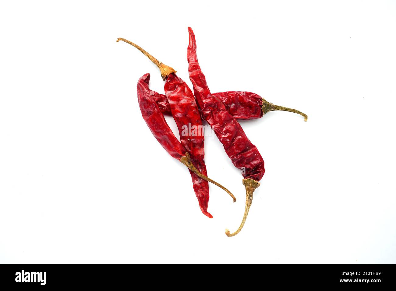 Red dried chilly in white background Stock Photo - Alamy