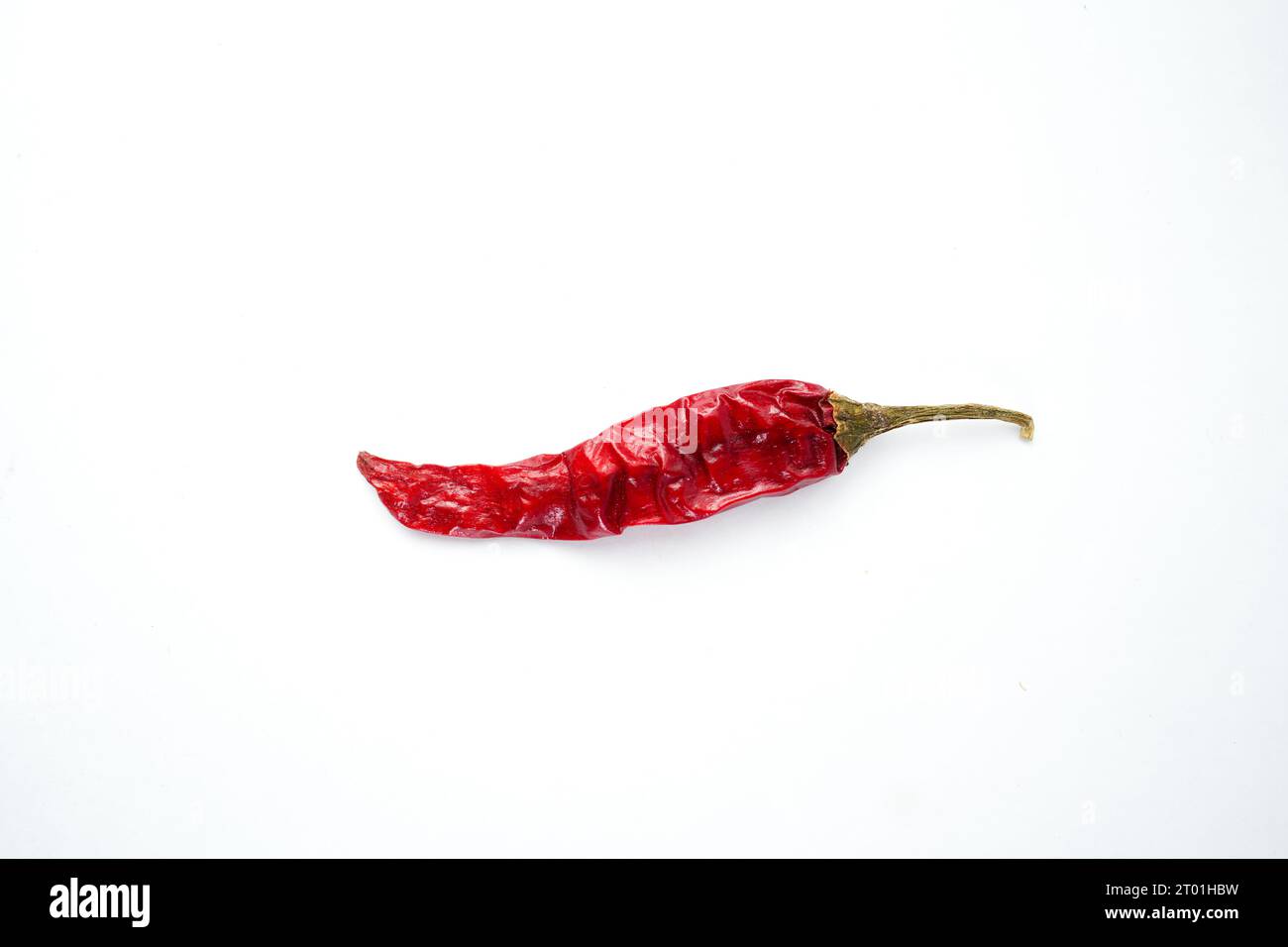 Red dried chilly in white background Stock Photo - Alamy