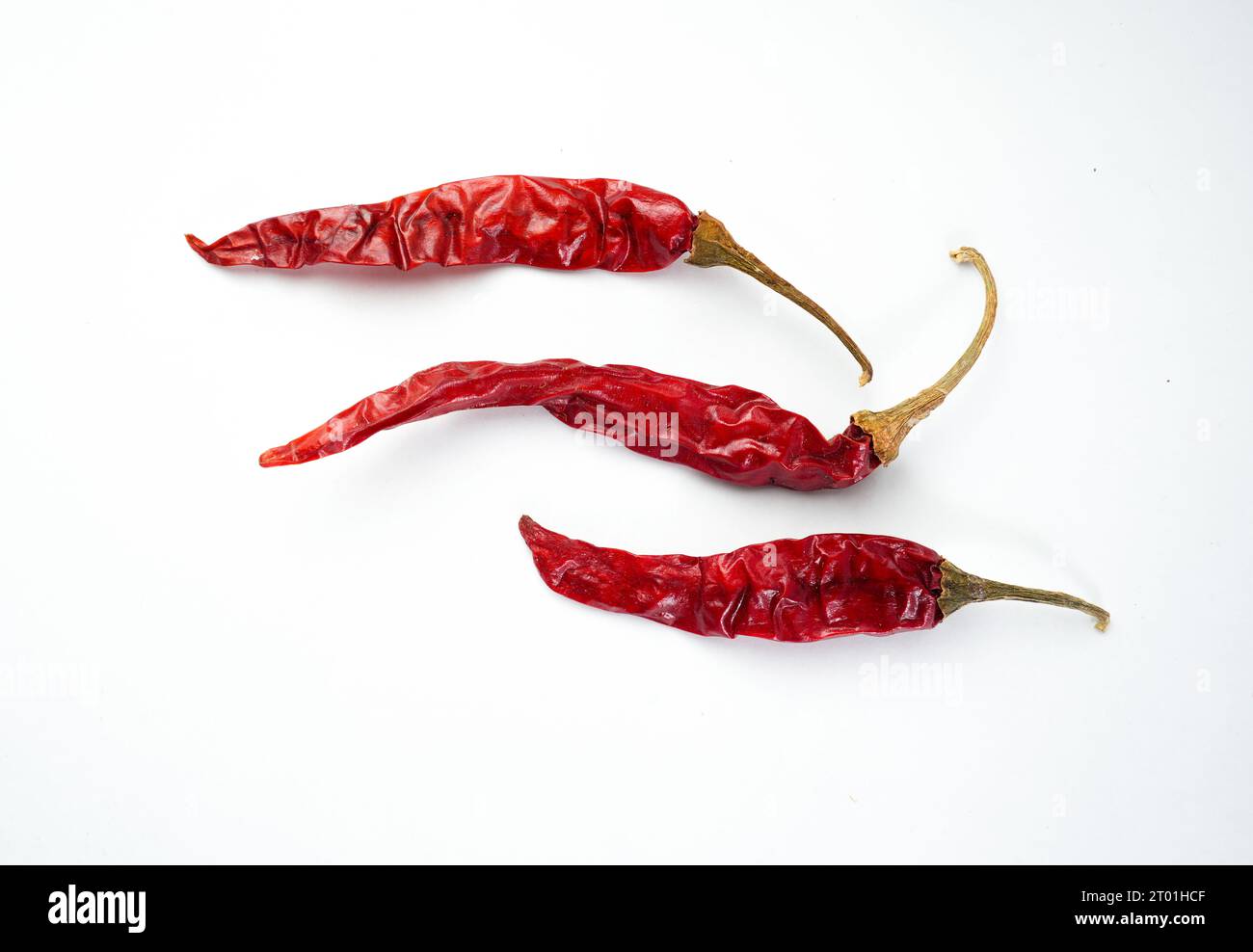 Red dried chilly in white background Stock Photo - Alamy