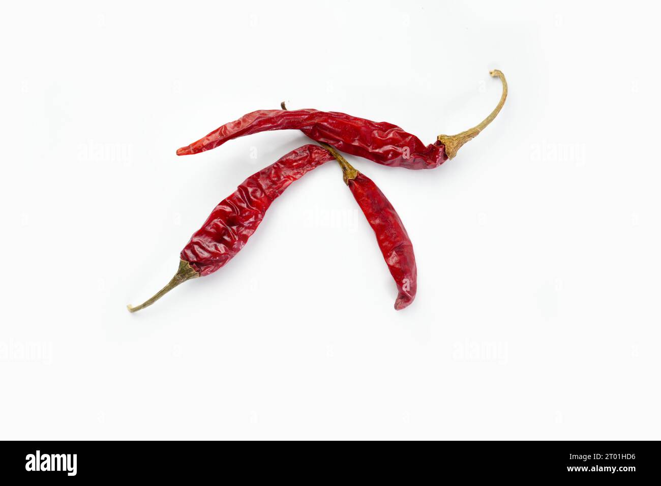 Red dried chilly in white background Stock Photo - Alamy