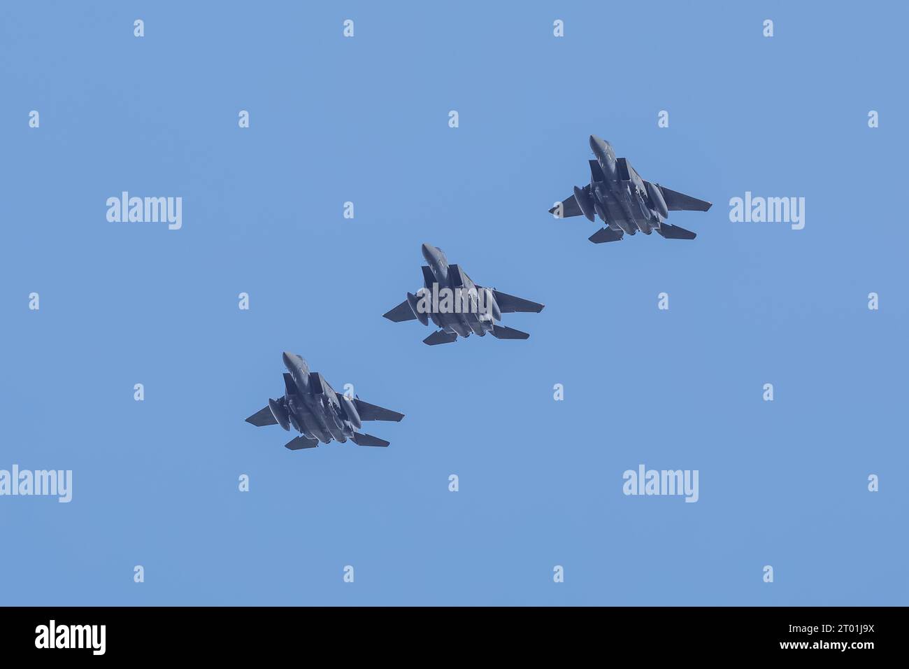 A trio of McDonnell Douglas F-15 Eagle in a close flying formation at ...