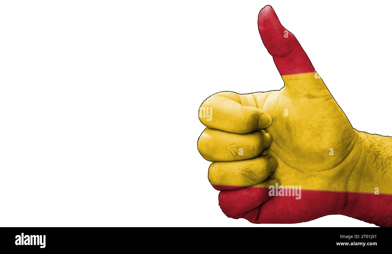 thumbs up in approval with the Spanish flag painted Stock Photo - Alamy