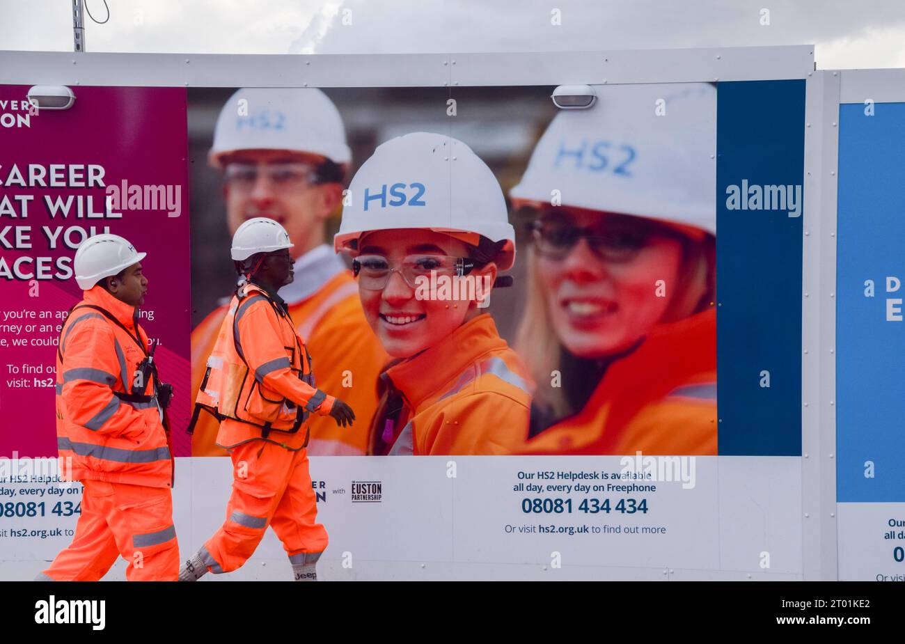 London, England, UK. 3rd Oct, 2023. Workers walk past the HS2 ...