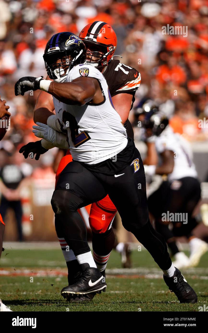 Baltimore Ravens defensive tackle Justin Madubuike (92) runs off of the ...