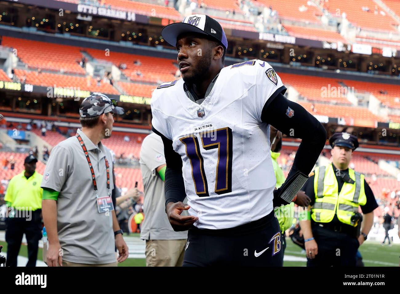 Baltimore Ravens quarterback Josh Johnson (17) jogs off of the field ...