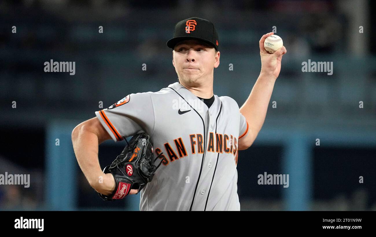 San Francisco Giants starting pitcher Kyle Harrison throws to the plate ...