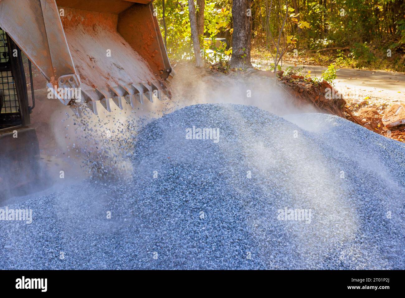 Tractor operators play critical role in road construction by laying ...