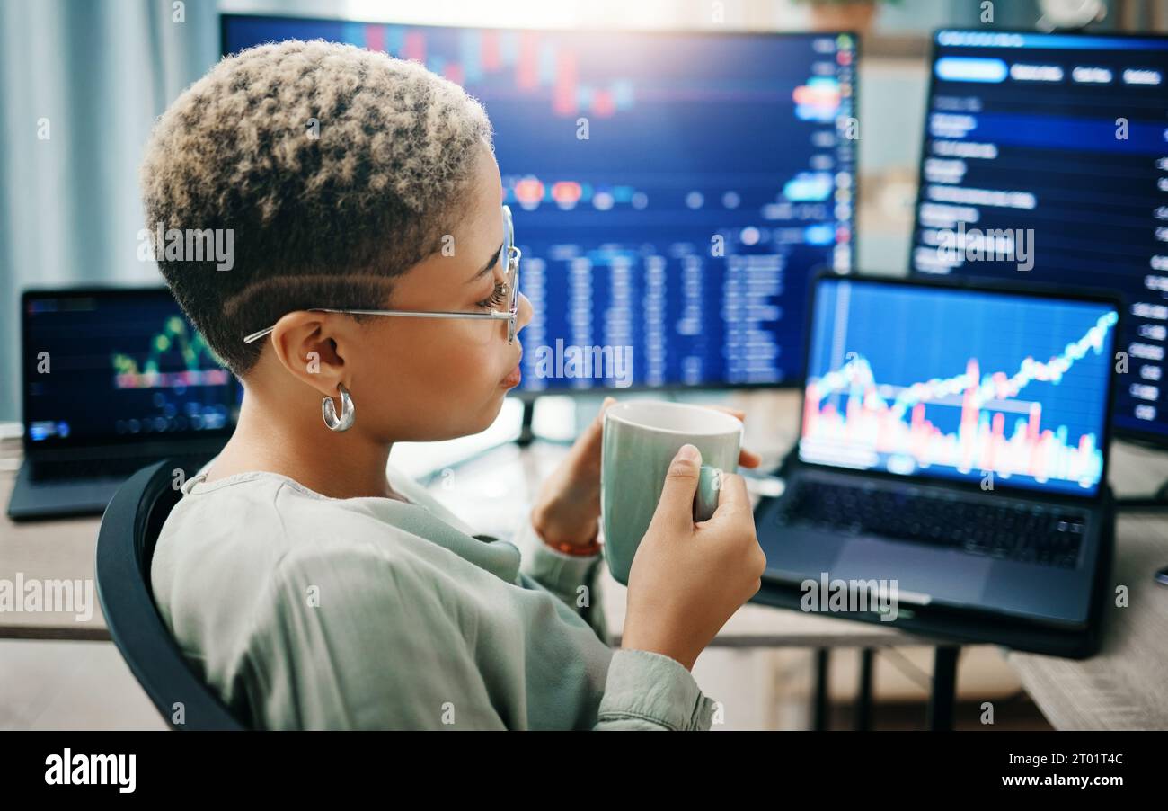 Trading, woman and coffee with investment, laptop and stock market with ...